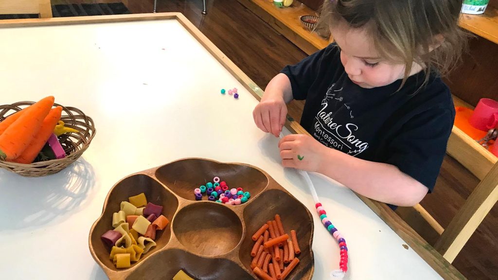 Bead Stringing - The School of Montessori